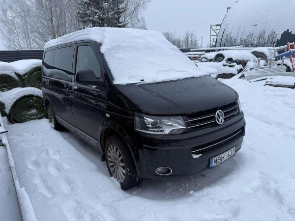 Melns Volkswagen Multivan 2010 Panevēža, ar dzinēja tilpumu 1.97 L un nobraukumu 294 tūkst. km par 9999 €, foto 2 vietnē AUTOMOTO.COM.LV