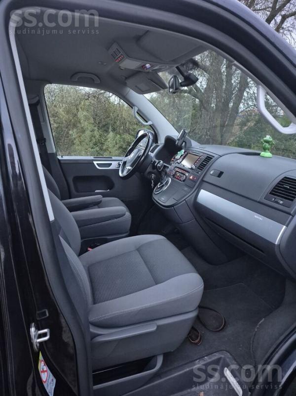Black Volkswagen Multivan 2010 in Liepaja, with an engine capacity of 2.00 L and mileage of 251 thousand km for 14500 €, photo 5 on AUTOMOTO.COM.LV