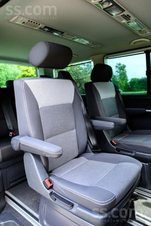 Black Volkswagen Multivan 2010 in Liepaja, with an engine capacity of 2.00 L and mileage of 25 thousand km for 11500 €, photo 6 on AUTOMOTO.COM.LV