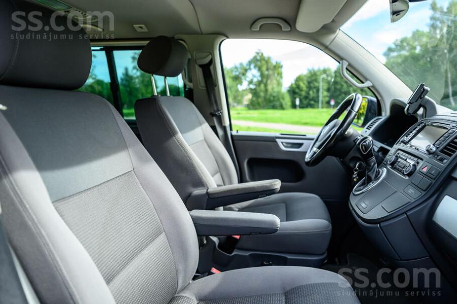 Black Volkswagen Multivan 2010 in Liepaja, with an engine capacity of 2.00 L and mileage of 25 thousand km for 11500 €, photo 7 on AUTOMOTO.COM.LV
