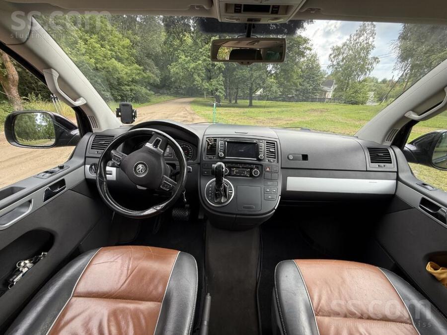 Melns Volkswagen Multivan 2011 Rīga, ar dzinēja tilpumu 2.00 L un nobraukumu 301 tūkst. km par 15500 €, foto 15 vietnē AUTOMOTO.COM.LV