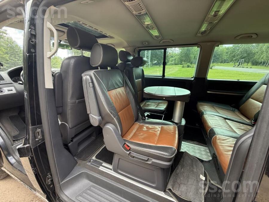 Melns Volkswagen Multivan 2011 Rīga, ar dzinēja tilpumu 2.00 L un nobraukumu 301 tūkst. km par 15500 €, foto 21 vietnē AUTOMOTO.COM.LV