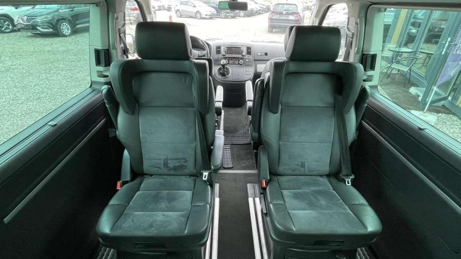 Black Volkswagen Multivan 2012 in Marijampole, with an engine capacity of 1.97 L and mileage of 293 thousand km for 12700 €, photo 3 on AUTOMOTO.COM.LV