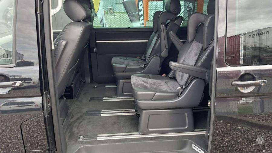 Black Volkswagen Multivan 2012 in Marijampole, with an engine capacity of 1.97 L and mileage of 293 thousand km for 12700 €, photo 15 on AUTOMOTO.COM.LV