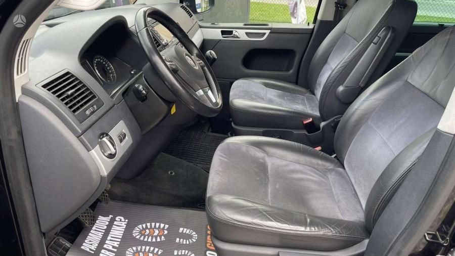 Black Volkswagen Multivan 2012 in Marijampole, with an engine capacity of 1.97 L and mileage of 293 thousand km for 12700 €, photo 16 on AUTOMOTO.COM.LV