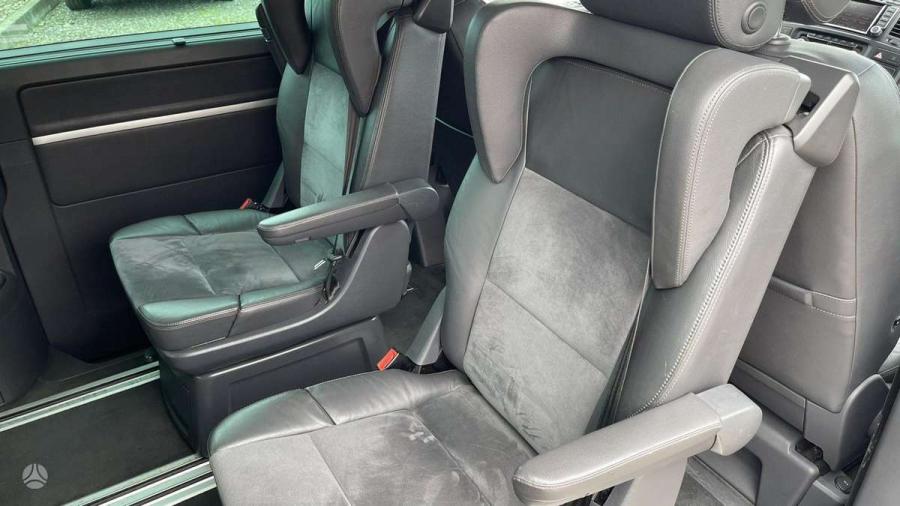 Black Volkswagen Multivan 2012 in Marijampole, with an engine capacity of 1.97 L and mileage of 293 thousand km for 12700 €, photo 36 on AUTOMOTO.COM.LV