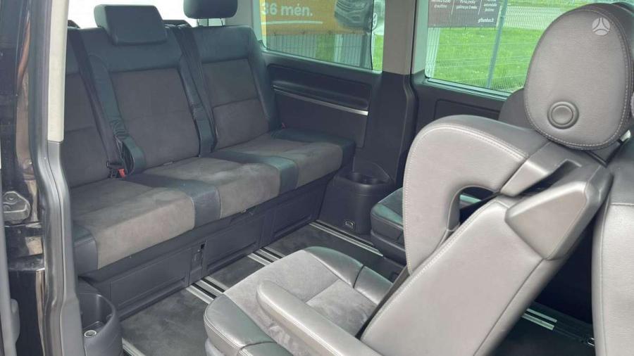 Black Volkswagen Multivan 2012 in Marijampole, with an engine capacity of 1.97 L and mileage of 293 thousand km for 12700 €, photo 37 on AUTOMOTO.COM.LV