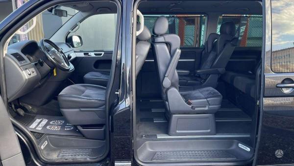 Black Volkswagen Multivan 2012 in Marijampole, with an engine capacity of 1.97 L and mileage of 293 thousand km for 12700 €, photo 3 on AUTOMOTO.COM.LV