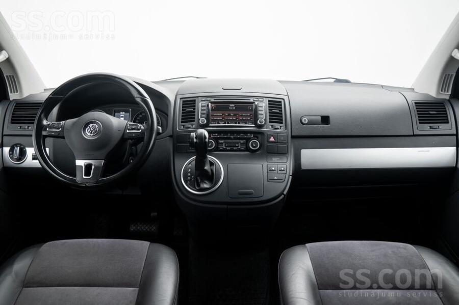 Black Volkswagen Multivan 2013 in Tallinn, with an engine capacity of 2.00 L and mileage of 191 thousand km for 19999 €, photo 3 on AUTOMOTO.COM.LV