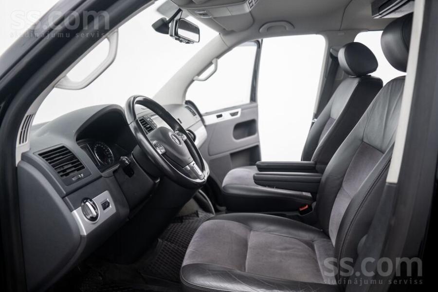 Black Volkswagen Multivan 2013 in Tallinn, with an engine capacity of 2.00 L and mileage of 191 thousand km for 19999 €, photo 9 on AUTOMOTO.COM.LV