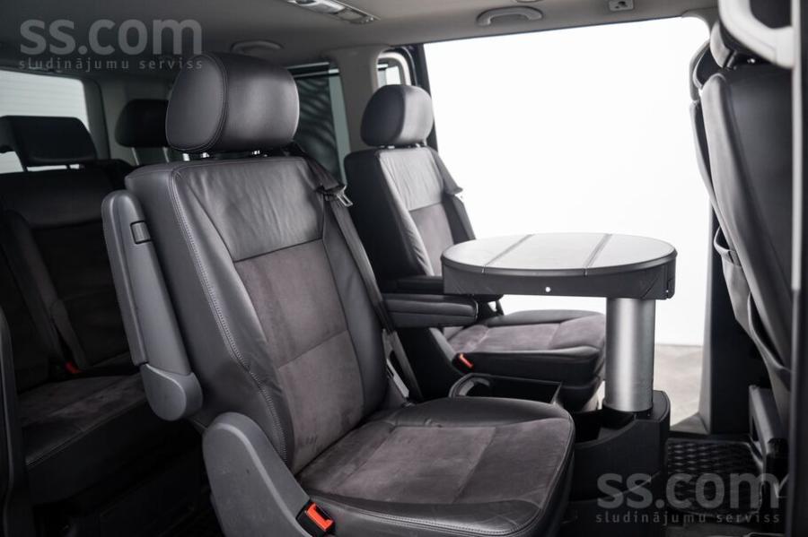 Black Volkswagen Multivan 2013 in Tallinn, with an engine capacity of 2.00 L and mileage of 191 thousand km for 19999 €, photo 12 on AUTOMOTO.COM.LV