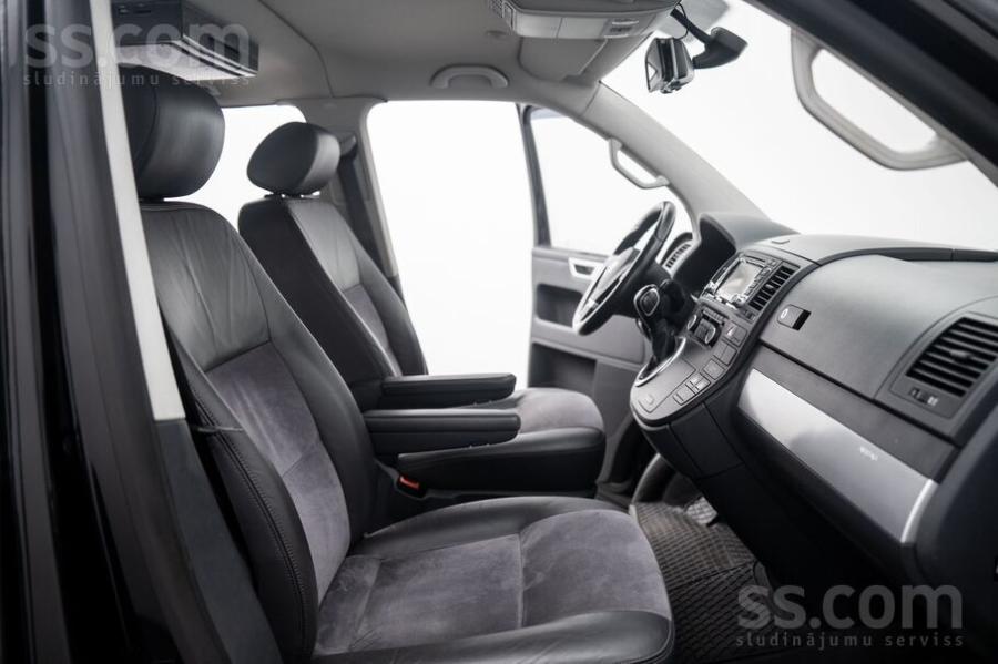 Black Volkswagen Multivan 2013 in Tallinn, with an engine capacity of 2.00 L and mileage of 191 thousand km for 19999 €, photo 13 on AUTOMOTO.COM.LV