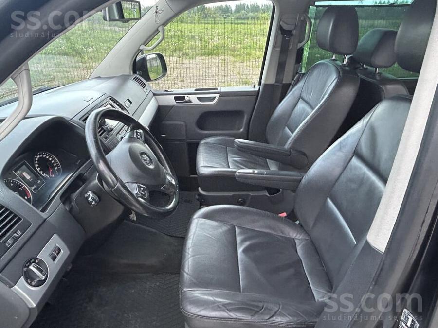 Melns Volkswagen Multivan 2014 Rīga, ar dzinēja tilpumu 2.00 L un nobraukumu 240 tūkst. km par 19900 €, foto 8 vietnē AUTOMOTO.COM.LV