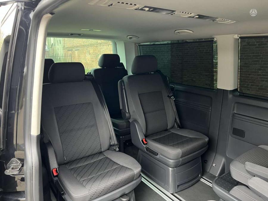 Black Volkswagen Multivan 2015 in Kedainiai, with an engine capacity of 1.97 L and mileage of 232 thousand km for 17350 €, photo 26 on AUTOMOTO.COM.LV
