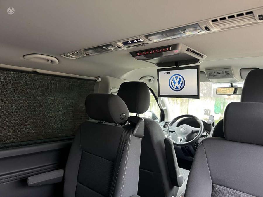Black Volkswagen Multivan 2015 in Kedainiai, with an engine capacity of 1.97 L and mileage of 232 thousand km for 17350 €, photo 28 on AUTOMOTO.COM.LV