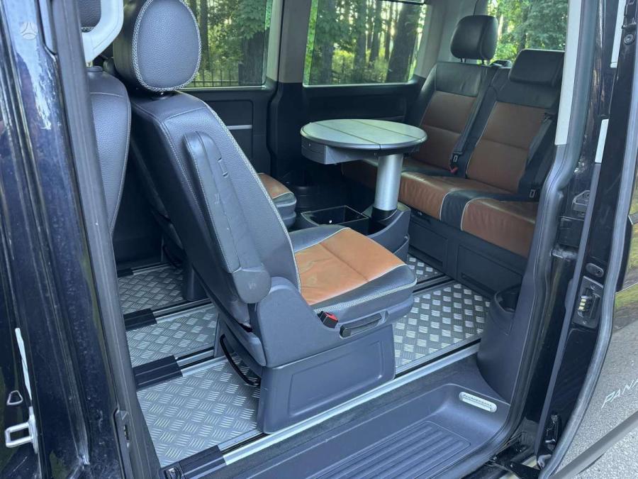 Black Volkswagen Multivan 2015 in Vilnius, with an engine capacity of 1.97 L and mileage of 307 thousand km for 17700 €, photo 15 on AUTOMOTO.COM.LV