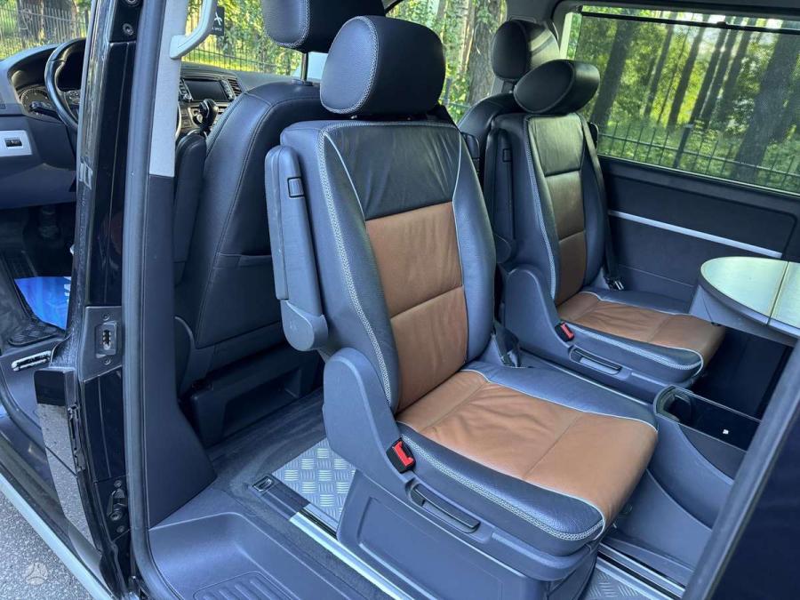 Black Volkswagen Multivan 2015 in Vilnius, with an engine capacity of 1.97 L and mileage of 307 thousand km for 17700 €, photo 16 on AUTOMOTO.COM.LV