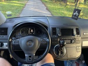 Black Volkswagen Multivan 2015 in Vilnius, with an engine capacity of 1.97 L and mileage of 307 thousand km for 17700 €, photo 27 on AUTOMOTO.COM.LV