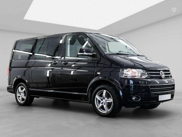 Black Volkswagen Multivan 2015 in Kaunas, with an engine capacity of 2.00 L and mileage of 291 thousand km for 14990 €, photo 5 on AUTOMOTO.COM.LV