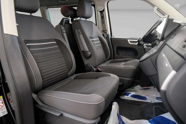 Black Volkswagen Multivan 2015 in Kaunas, with an engine capacity of 2.00 L and mileage of 291 thousand km for 14990 €, photo 11 on AUTOMOTO.COM.LV