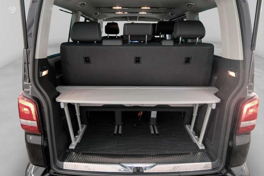Black Volkswagen Multivan 2015 in Kaunas, with an engine capacity of 2.00 L and mileage of 291 thousand km for 14990 €, photo 13 on AUTOMOTO.COM.LV