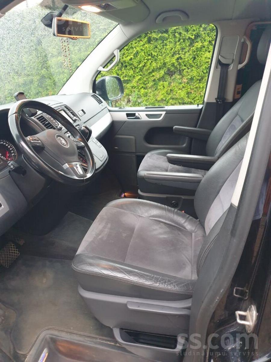 Melns Volkswagen Multivan 2015 Rīga, ar dzinēja tilpumu 2.00 L un nobraukumu 358 tūkst. km par 18000 €, foto 6 vietnē AUTOMOTO.COM.LV