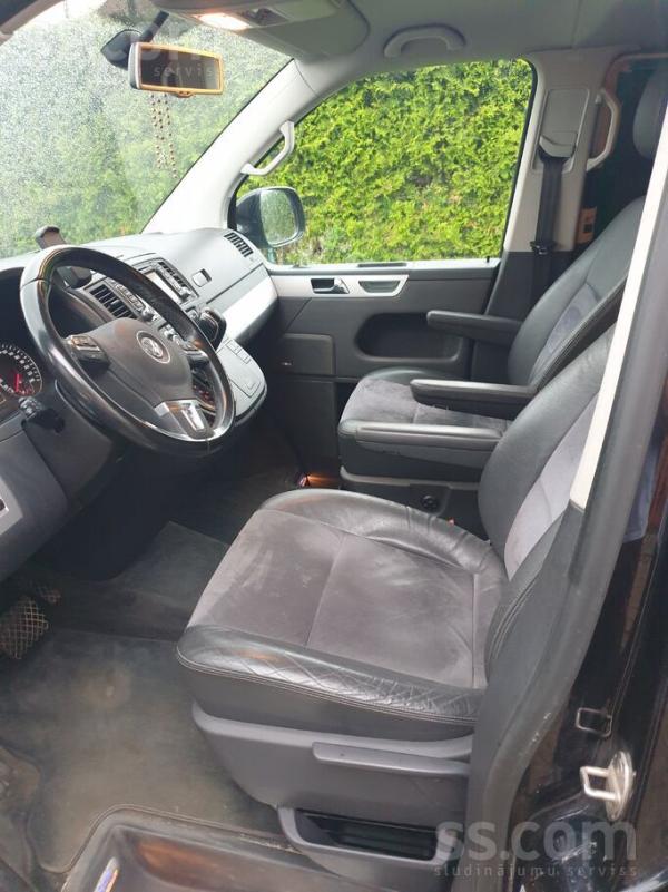 Melns Volkswagen Multivan 2015 Rīga, ar dzinēja tilpumu 2.00 L un nobraukumu 358 tūkst. km par 18000 €, foto 11 vietnē AUTOMOTO.COM.LV