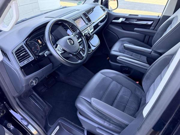 Black Volkswagen Multivan 2016 in Kaunas, with an engine capacity of 1.97 L and mileage of 169 thousand km for 21900 €, photo 9 on AUTOMOTO.COM.LV
