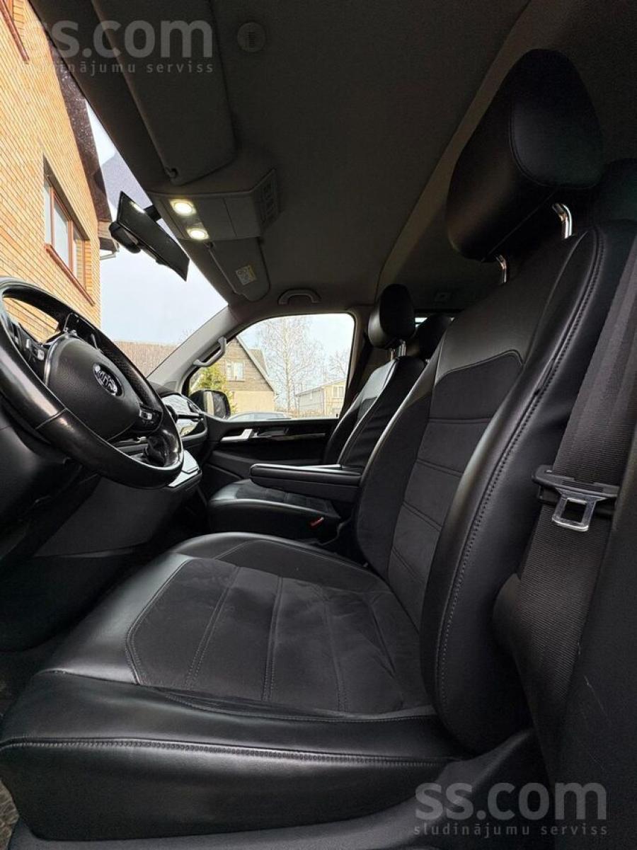 Black Volkswagen Multivan 2018 in Riga, with an engine capacity of 2.00 L and mileage of 235 thousand km for 26490 €, photo 13 on AUTOMOTO.COM.LV
