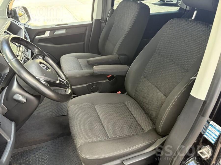 Black Volkswagen Multivan 2018 in Riga, with an engine capacity of 2.00 L and mileage of 195 thousand km for 25500 €, photo 10 on AUTOMOTO.COM.LV