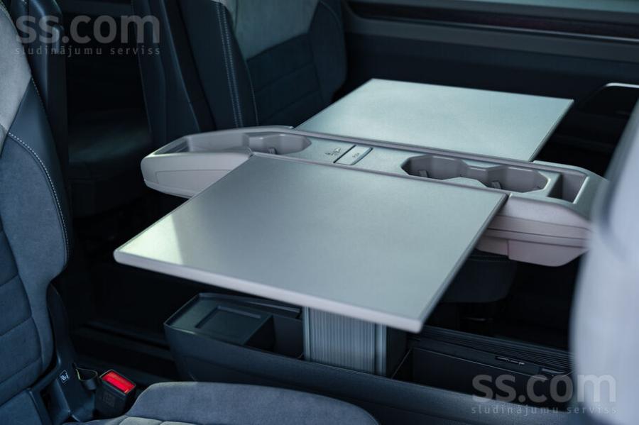 Melns Volkswagen Multivan 2024 Rīga, ar dzinēja tilpumu 1.40 L un nobraukumu 25 tūkst. km par 53500 €, foto 36 vietnē AUTOMOTO.COM.LV