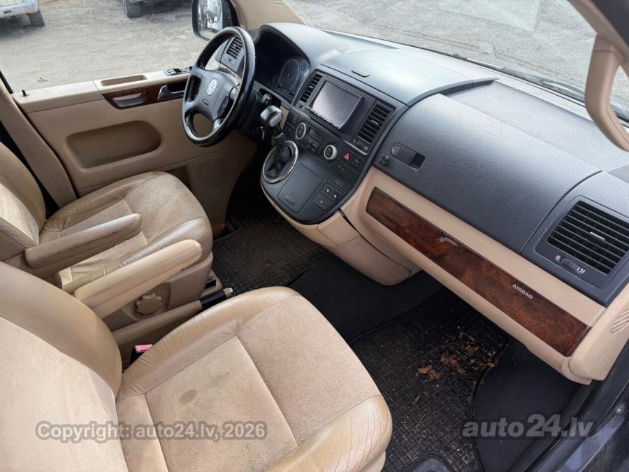 Melns Volkswagen Multivan 2006 Rakvere, ar dzinēja tilpumu 2.50 L un nobraukumu 271 tūkst. km par 5900 €, foto 20 vietnē AUTOMOTO.COM.LV
