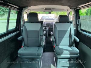 Black Volkswagen Multivan 2008 in Tartu, with an engine capacity of 2.50 L and mileage of 243 thousand km for 11900 €, photo 10 on AUTOMOTO.COM.LV