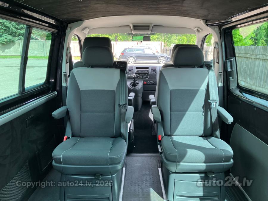 Black Volkswagen Multivan 2008 in Tartu, with an engine capacity of 2.50 L and mileage of 243 thousand km for 11900 €, photo 10 on AUTOMOTO.COM.LV