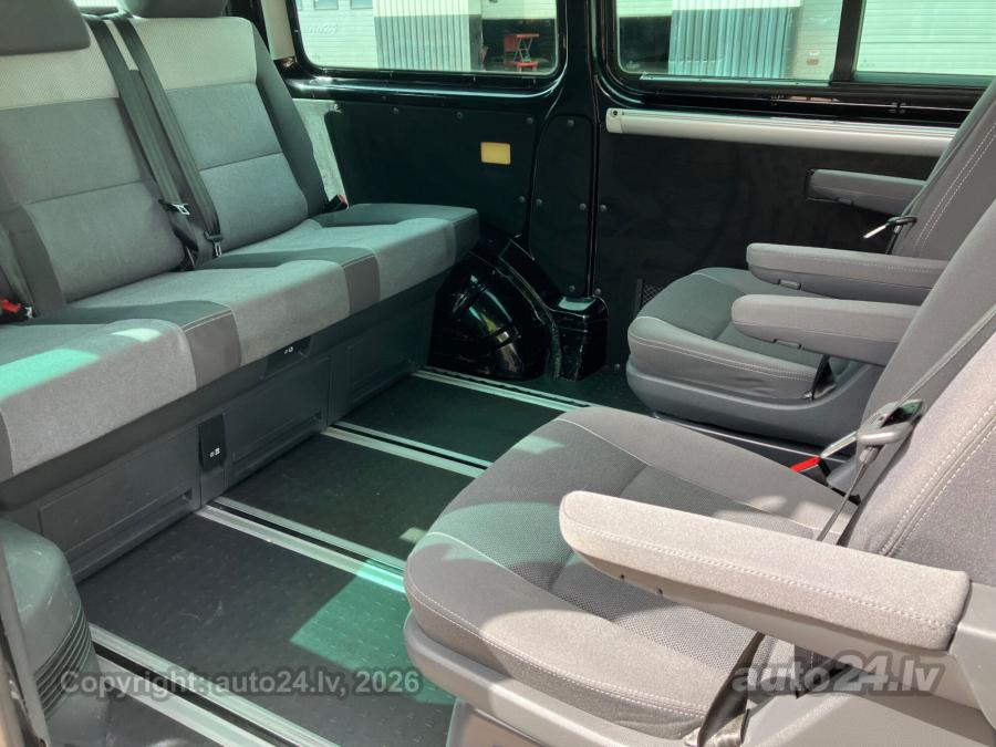 Black Volkswagen Multivan 2008 in Tartu, with an engine capacity of 2.50 L and mileage of 243 thousand km for 11900 €, photo 11 on AUTOMOTO.COM.LV