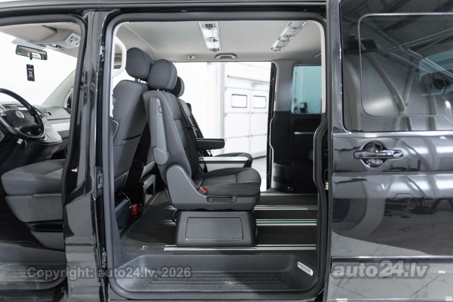 Black Volkswagen Multivan 2008 in Tallinn, with an engine capacity of 2.50 L and mileage of 160 thousand km for 10990 €, photo 19 on AUTOMOTO.COM.LV