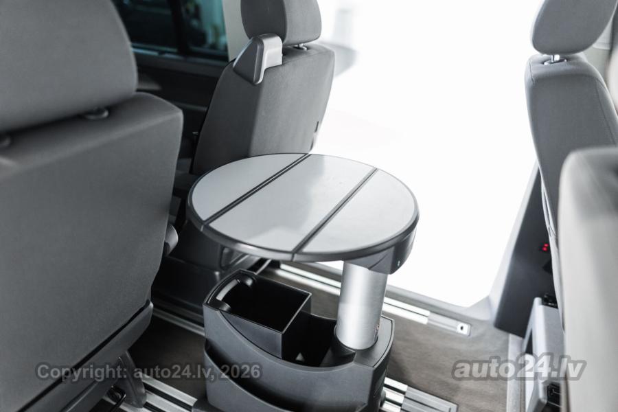 Black Volkswagen Multivan 2008 in Tallinn, with an engine capacity of 2.50 L and mileage of 160 thousand km for 10990 €, photo 25 on AUTOMOTO.COM.LV