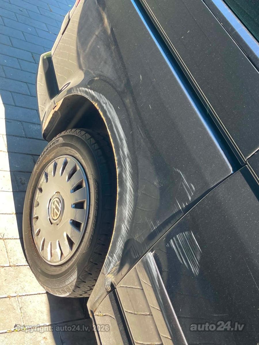 Melns Volkswagen Multivan 2008 Tallina, ar dzinēja tilpumu 2.50 L un nobraukumu 390 tūkst. km par 7800 €, foto 15 vietnē AUTOMOTO.COM.LV