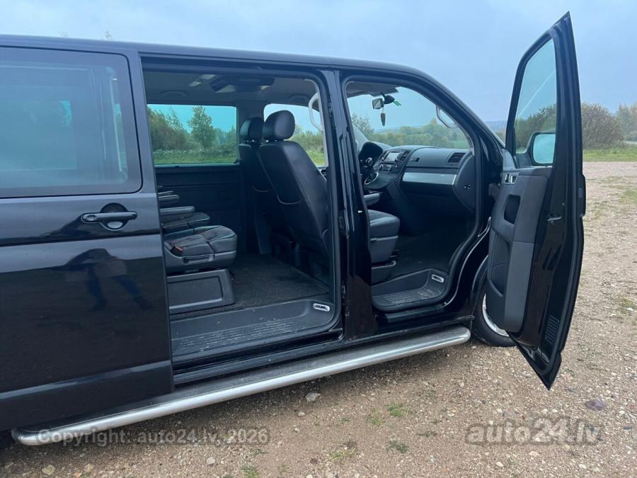 Melns Volkswagen Multivan 2013 Tallina, ar dzinēja tilpumu 2.00 L un nobraukumu 359 tūkst. km par 18000 €, foto 17 vietnē AUTOMOTO.COM.LV