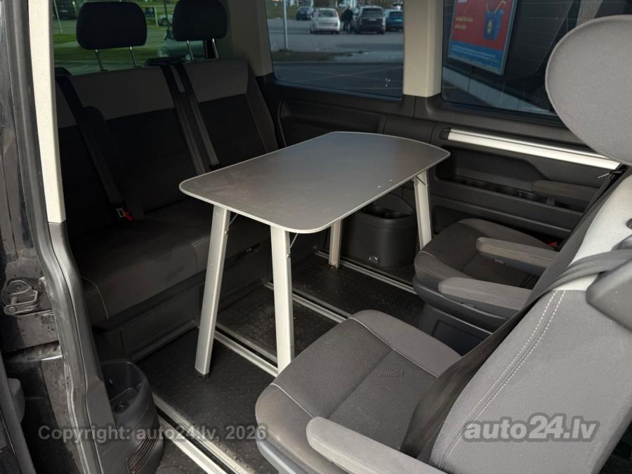 Melns Volkswagen Multivan 2013 Tartu, ar dzinēja tilpumu 2.00 L un nobraukumu 335 tūkst. km par 12300 €, foto 11 vietnē AUTOMOTO.COM.LV