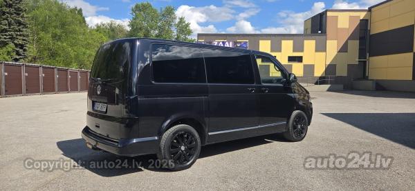 Black Volkswagen Multivan 2013 in Tartu, with an engine capacity of 2.00 L and mileage of 406 thousand km for 14990 €, photo 4 on AUTOMOTO.COM.LV