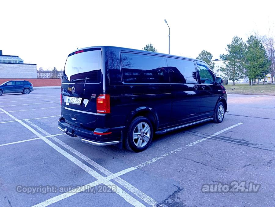 Black Volkswagen Multivan 2016 in Tallinn, with an engine capacity of 2.00 L and mileage of 345 thousand km for 19999 €, photo 4 on AUTOMOTO.COM.LV