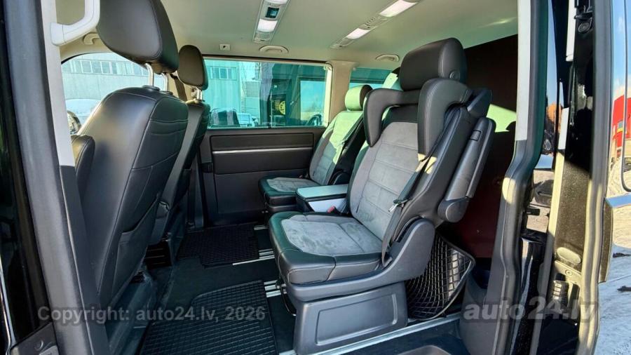 Black Volkswagen Multivan 2020 in Tallinn, with an engine capacity of 2.00 L and mileage of 124 thousand km for 49900 €, photo 19 on AUTOMOTO.COM.LV