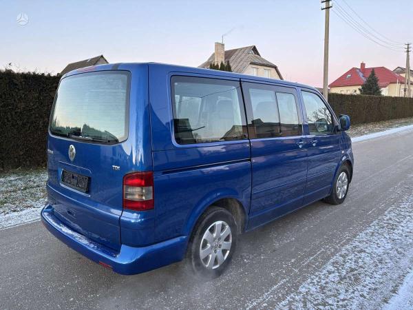 Blue Volkswagen Multivan 2004 in Jurbarkas, with an engine capacity of 2.46 L and mileage of 265 thousand km for 6300 €, photo 6 on AUTOMOTO.COM.LV