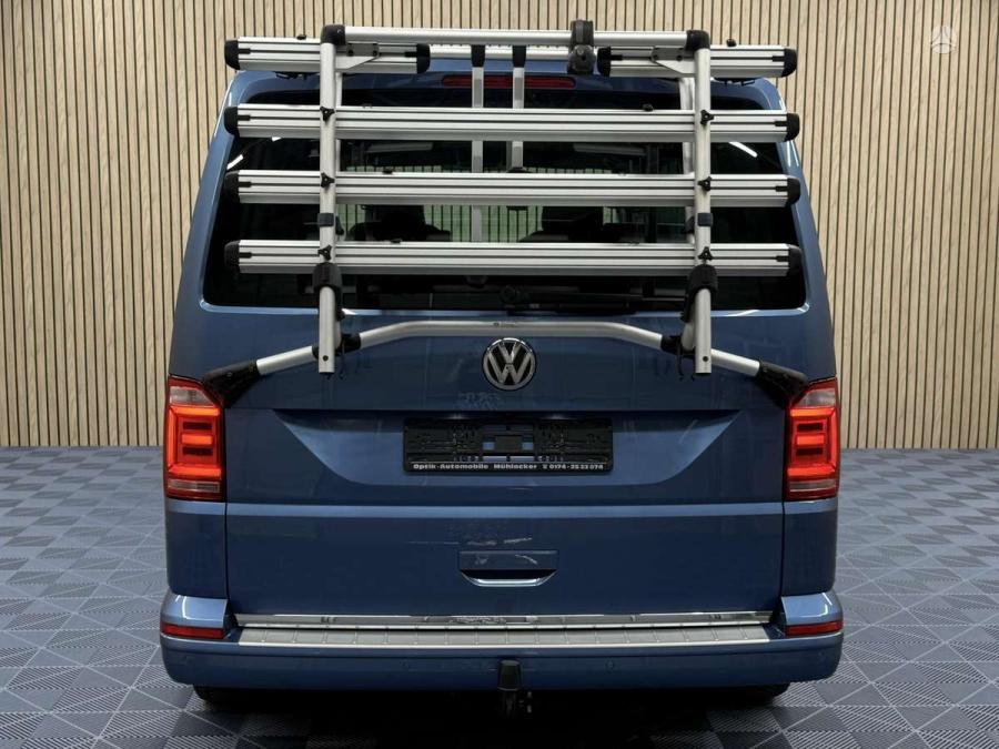 Zils Volkswagen Multivan 2015 Marijampole, ar dzinēja tilpumu 1.97 L un nobraukumu 229 tūkst. km par 23350 €, foto 7 vietnē AUTOMOTO.COM.LV