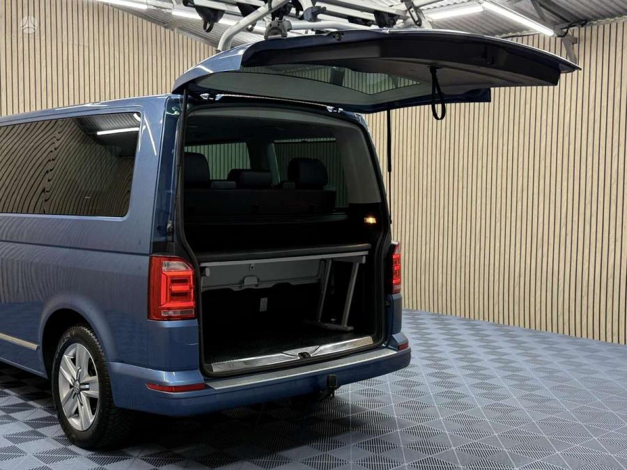 Zils Volkswagen Multivan 2015 Marijampole, ar dzinēja tilpumu 1.97 L un nobraukumu 229 tūkst. km par 23350 €, foto 13 vietnē AUTOMOTO.COM.LV