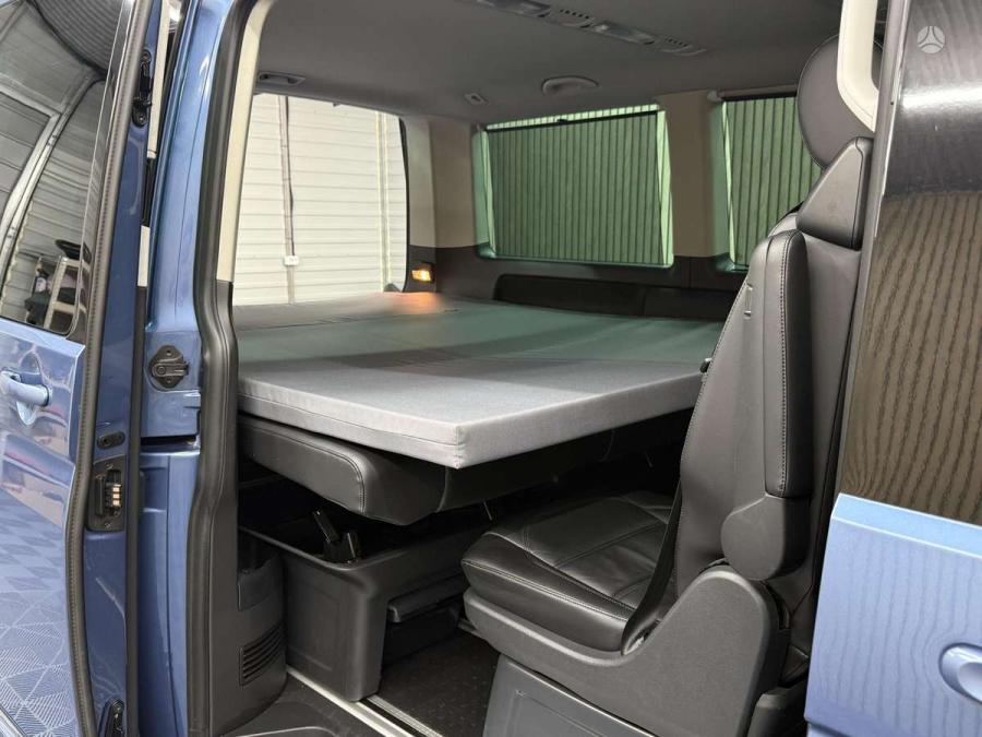 Zils Volkswagen Multivan 2015 Marijampole, ar dzinēja tilpumu 1.97 L un nobraukumu 229 tūkst. km par 23350 €, foto 24 vietnē AUTOMOTO.COM.LV