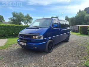 Zils Volkswagen Multivan 2002 Rīga, ar dzinēja tilpumu 2.50 L un nobraukumu 460 tūkst. km par 7500 €, foto  vietnē AUTOMOTO.COM.LV