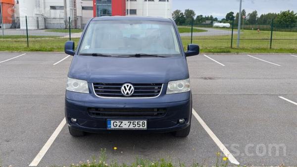 Zils Volkswagen Multivan 2008 Rīga, ar dzinēja tilpumu 2.50 L un nobraukumu 292 tūkst. km par 9500 €, foto 1 vietnē AUTOMOTO.COM.LV