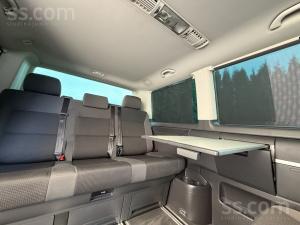 Blue Volkswagen Multivan 2011 in Ludza, with an engine capacity of 2.00 L and mileage of 0 thousand km for 17500 €, photo 32 on AUTOMOTO.COM.LV
